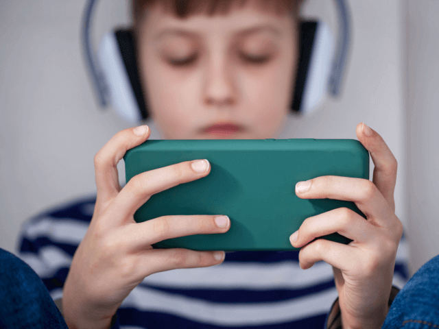 British Children Spend Over 4 Hours a Day Staring at Screens After ...